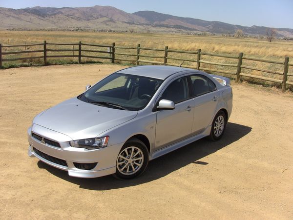Video: 2012 Mitsubishi Lancer 2.4L AWD 0-60 MPH Drive and Review - TFLcar
