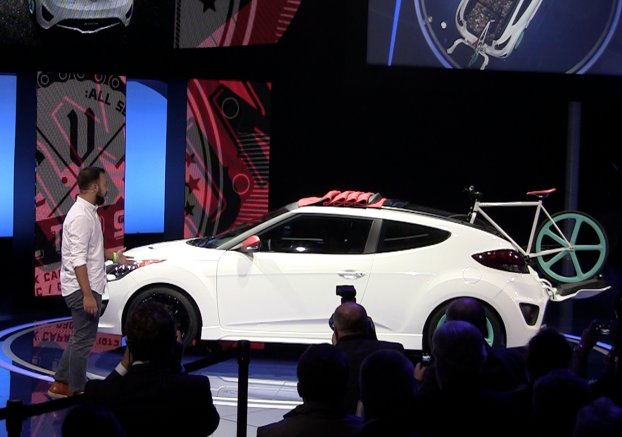 Watch the Hyundai Veloster C3 Roll Top Concept swallow a bike at the ...